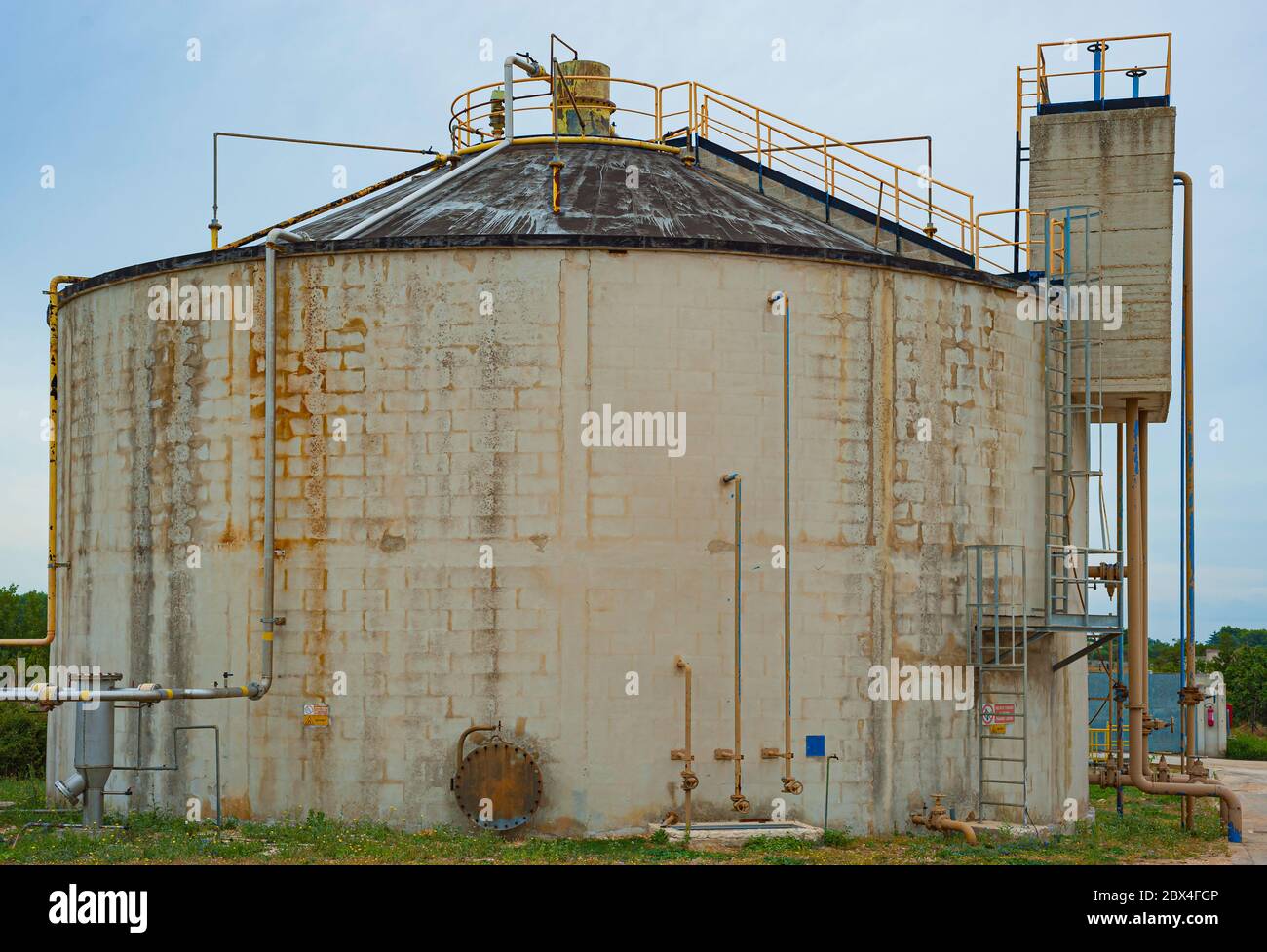 Sewage treatment plant. Primary sedimentation basin, sewage flowing ...