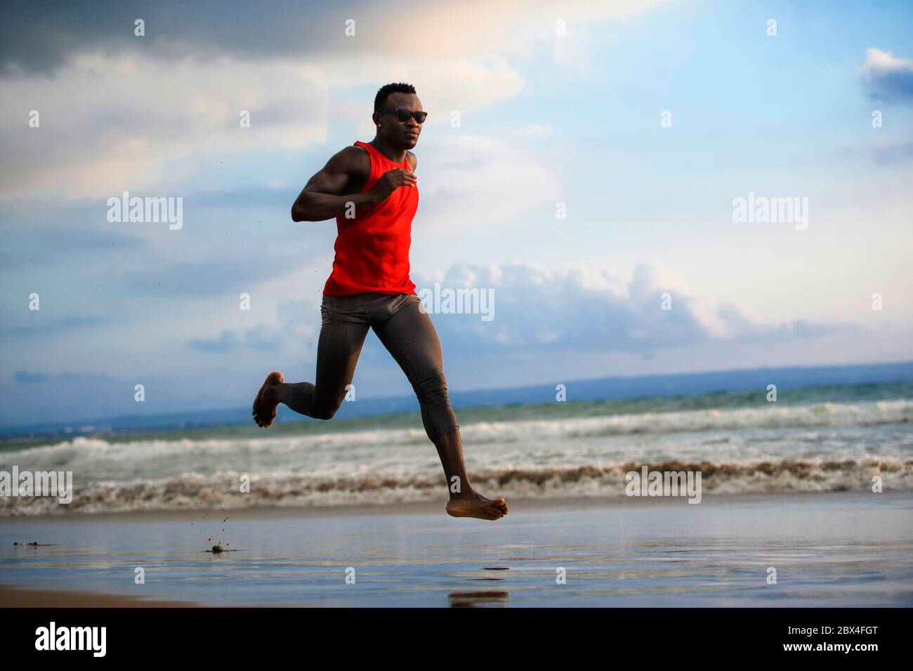 young attractive fit athletic and strong black African American man ...