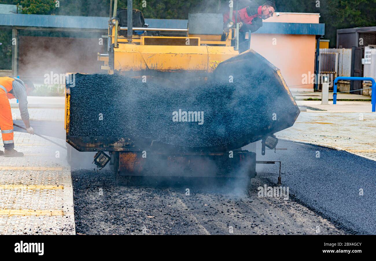 Hot asphalt spreading machine hi-res stock photography and images - Alamy