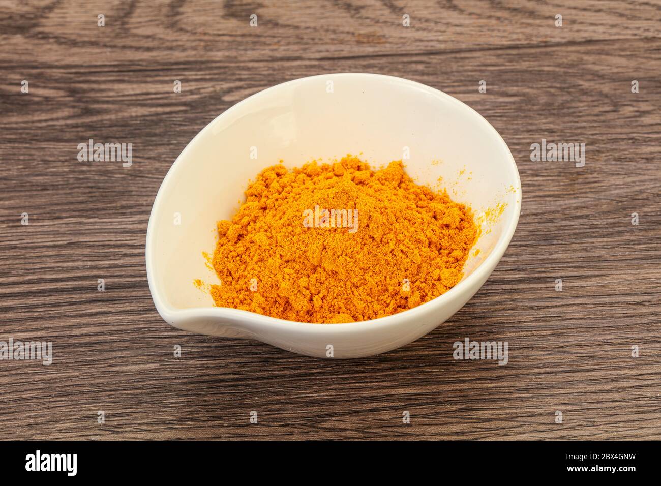 Tumeric - curcuma powder in the bowl Stock Photo - Alamy