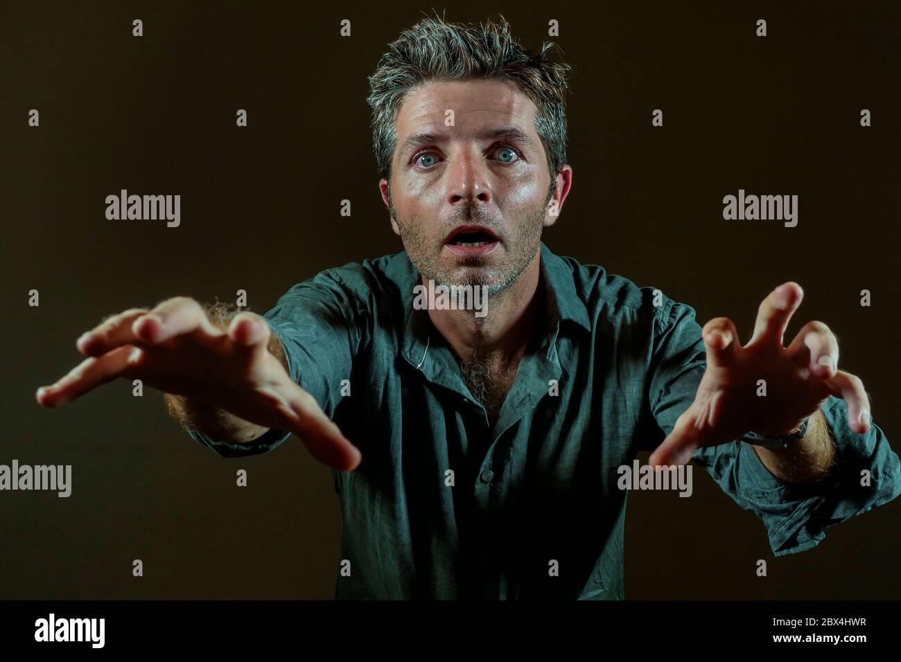 hypnotized and mesmerized facial expression portrait of young ...