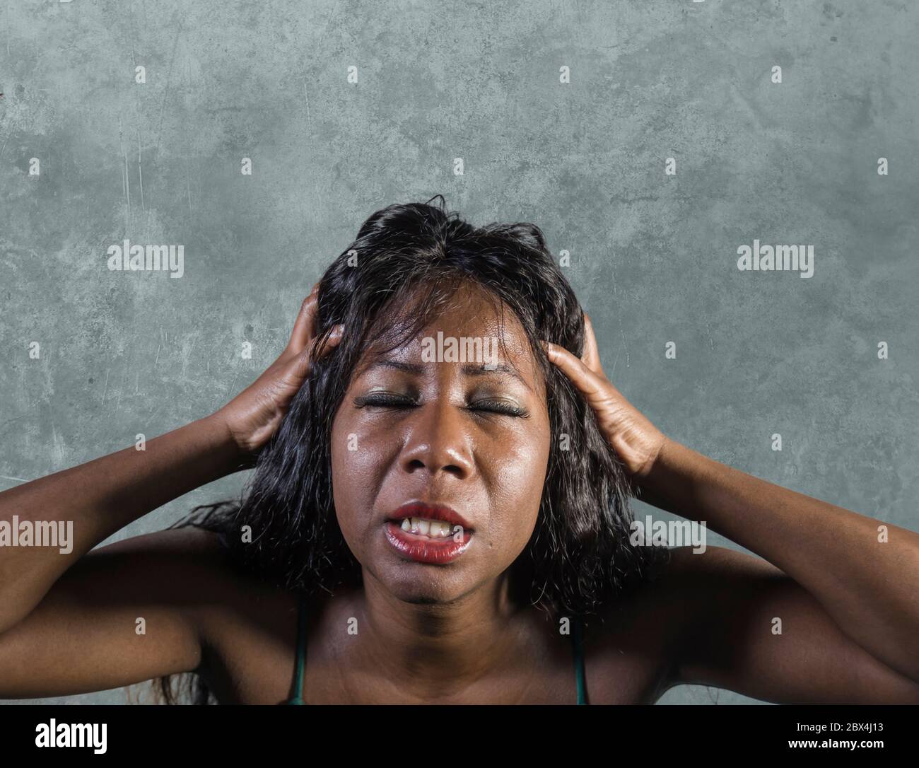 young crazy desperate and anxious black african American woman feeling ...