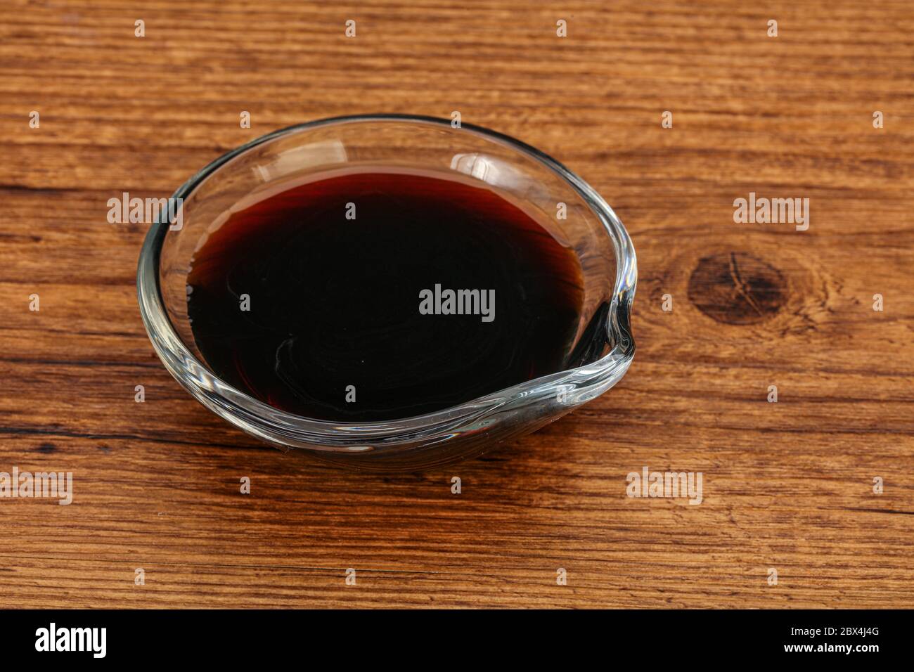 Asian cuisine - soya sauce in the bowl Stock Photo - Alamy