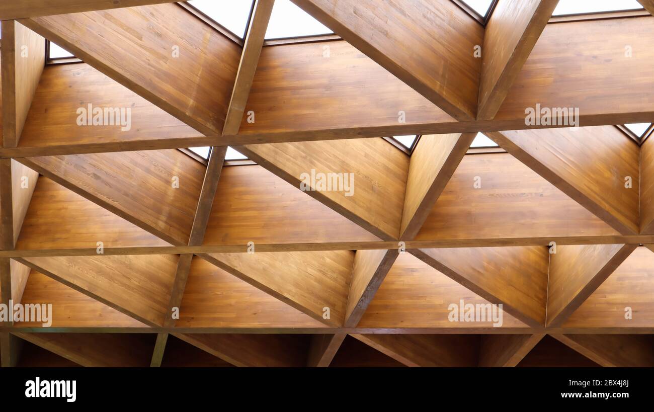 Luxurious geometric wooden triangles in construction. The concept of ...