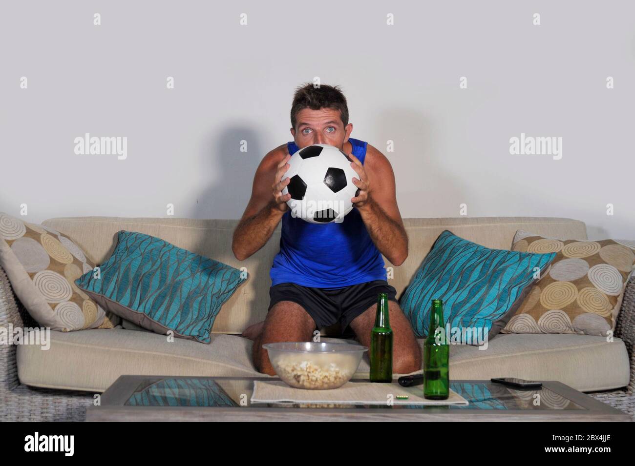 passionate football fan supporter man watching match on television ...