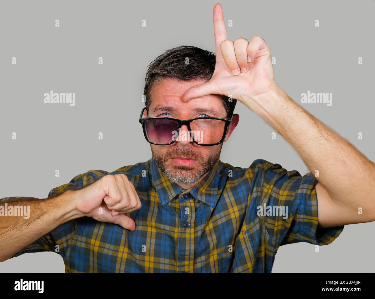 Symbol idiot hi-res stock photography and images - Alamy