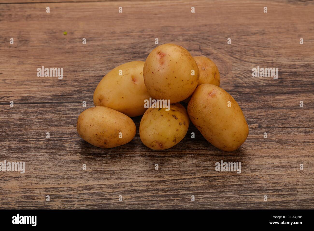 Raw fresh baby young potato heap Stock Photo - Alamy