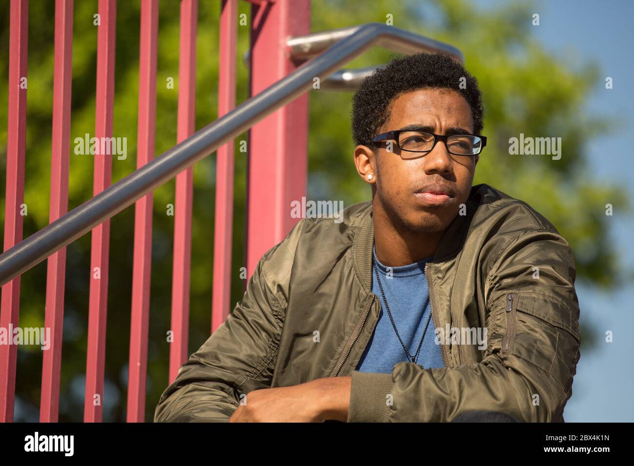African American teenage boy smiling Stock Photo - Alamy