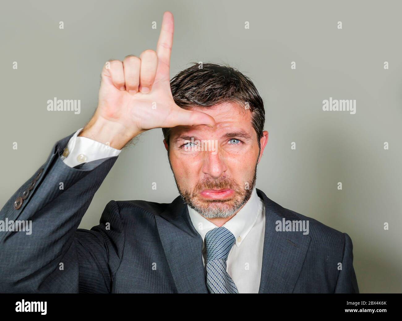 Hand in front of forehead hi-res stock photography and images - Alamy