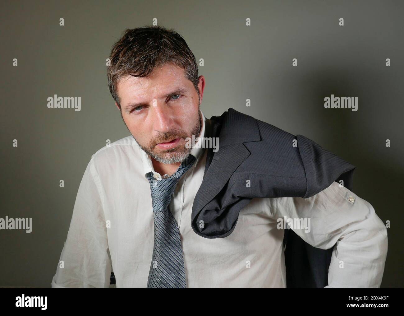 Young man messy shirt tie hi-res stock photography and images - Alamy
