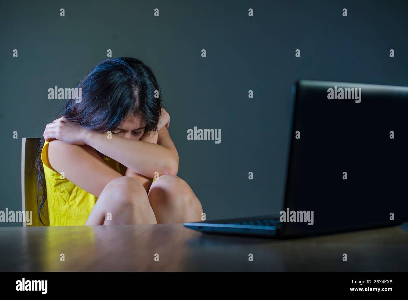dramatic portrait of scared and stressed Asian Korean teenager girl or ...