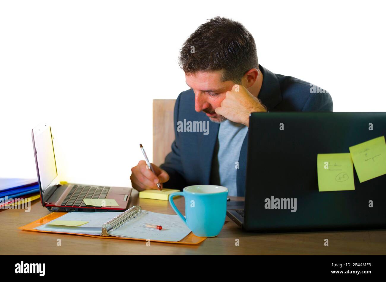 lifestyle portrait of young attractive busy and confident businessman ...