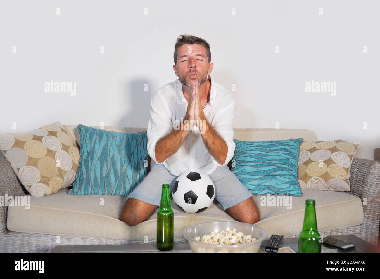 Man eating at football match hi-res stock photography and images - Alamy