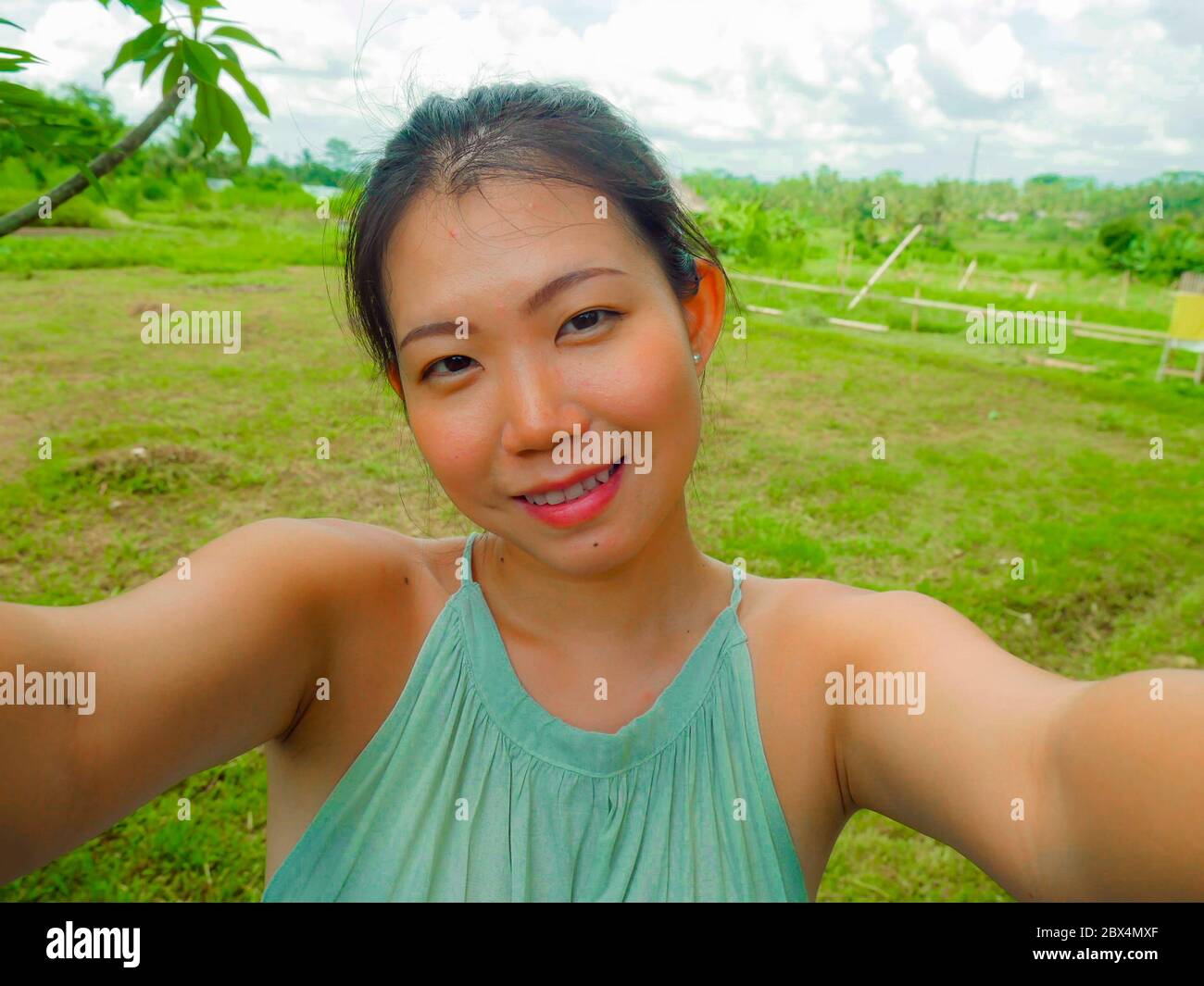 Young Happy And Attractive Asian Chinese Woman Taking Selfie Self