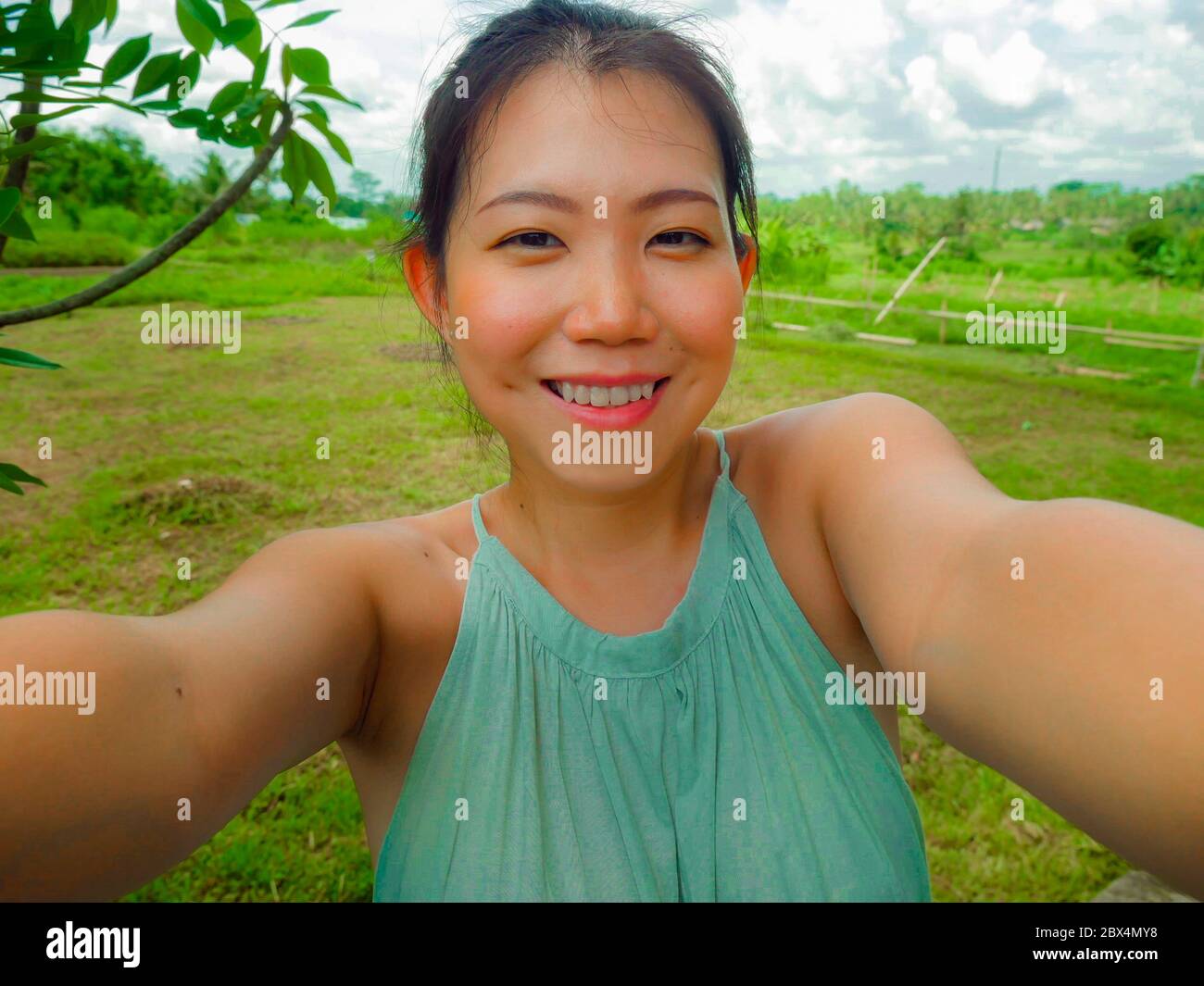 Young Happy And Attractive Asian Chinese Woman Taking Selfie Self