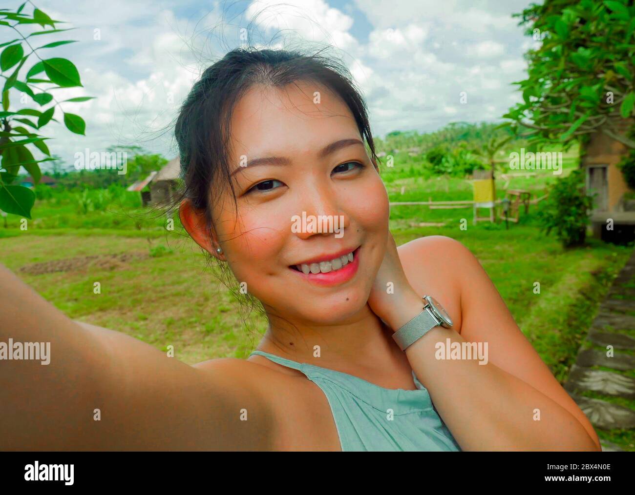 Young Happy And Attractive Asian Chinese Woman Taking Selfie Self