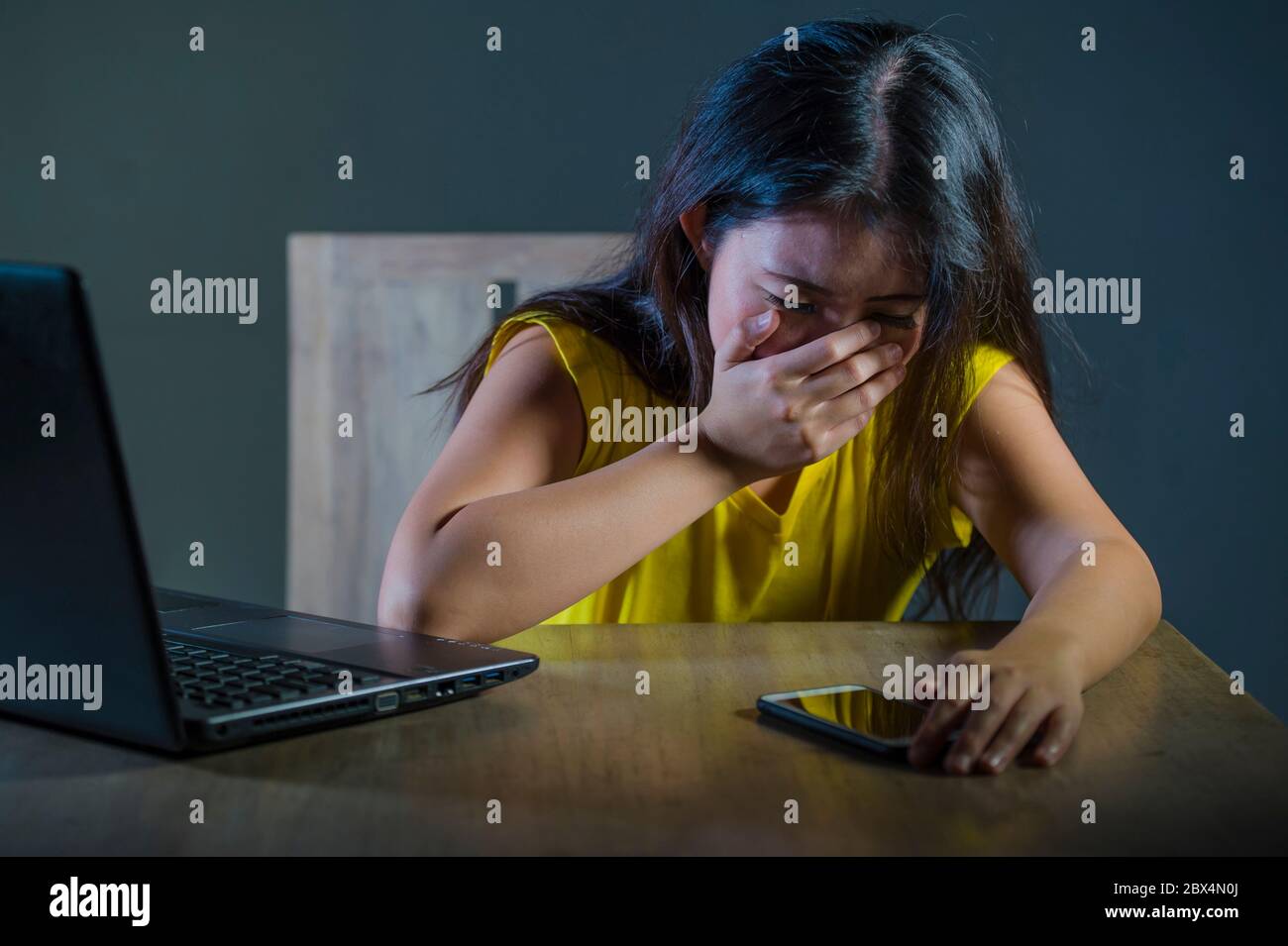 dramatic portrait scared and stressed Asian Korean teen girl or young ...