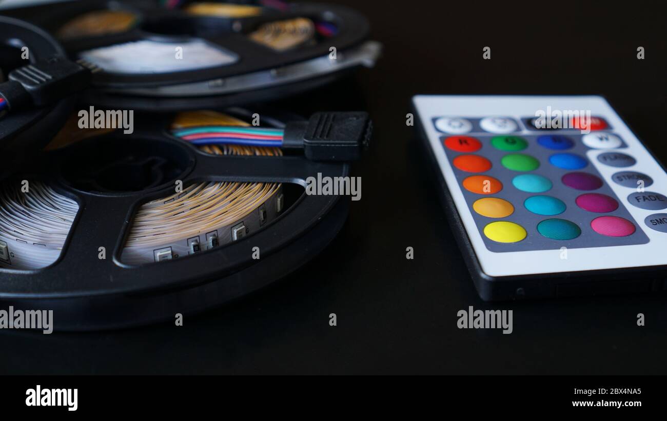 Led strip coils closeup. Diode with control panel for switching colors ...