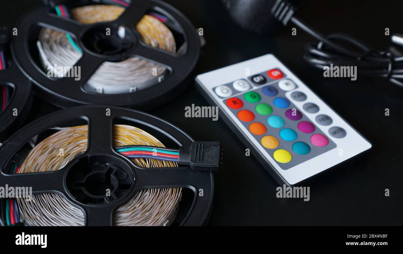 Led strip coils closeup. Diode with control panel for switching colors ...