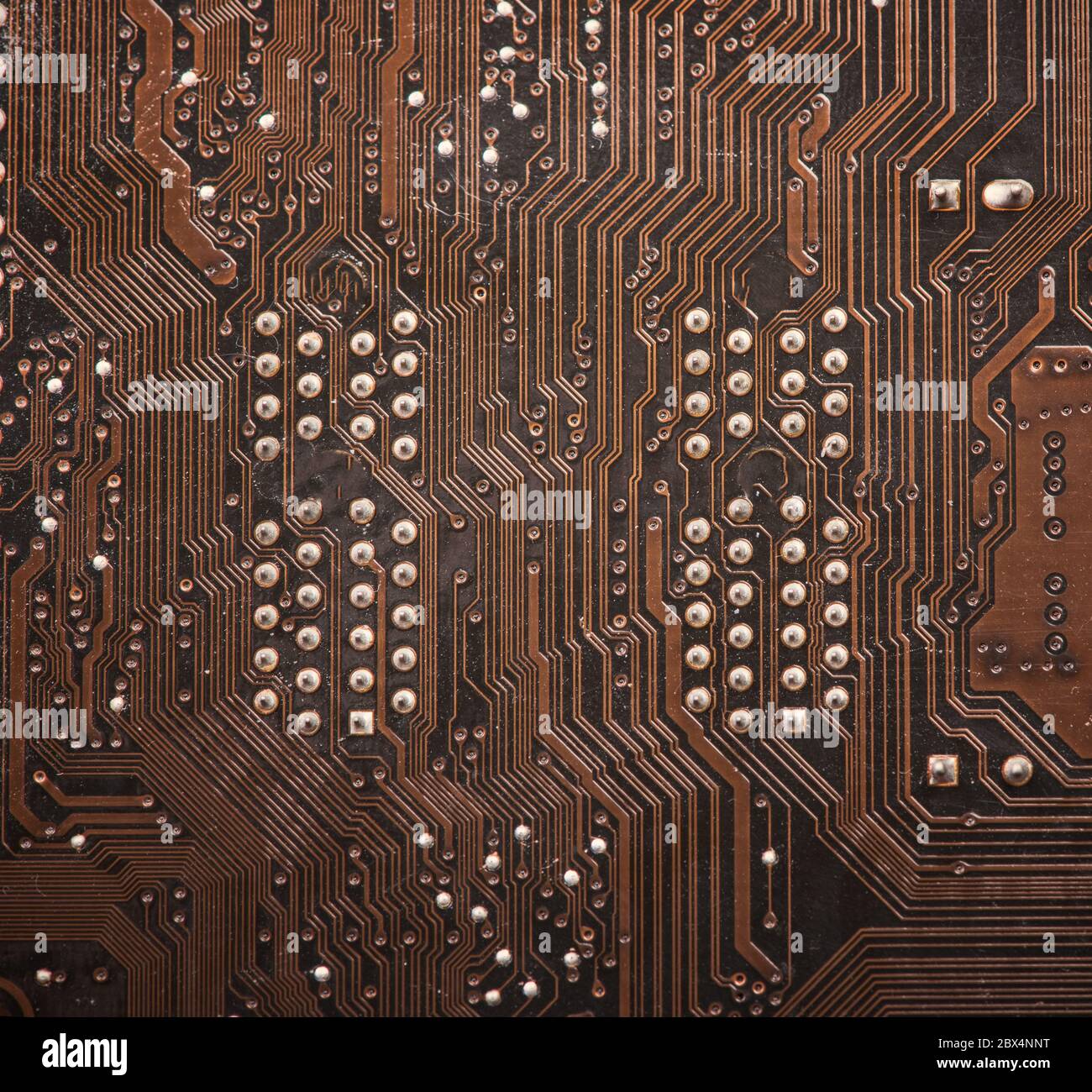 Modern printed brown circuit board, electronic circuit board, textolite ...