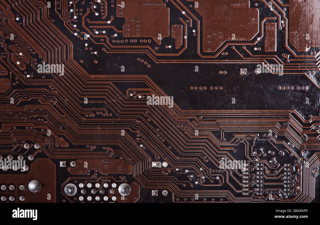 Modern printed brown circuit board, electronic circuit board, textolite ...