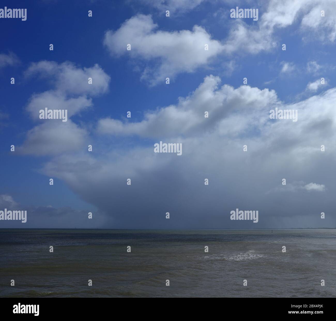 Storm cloud over the sea Stock Photo - Alamy