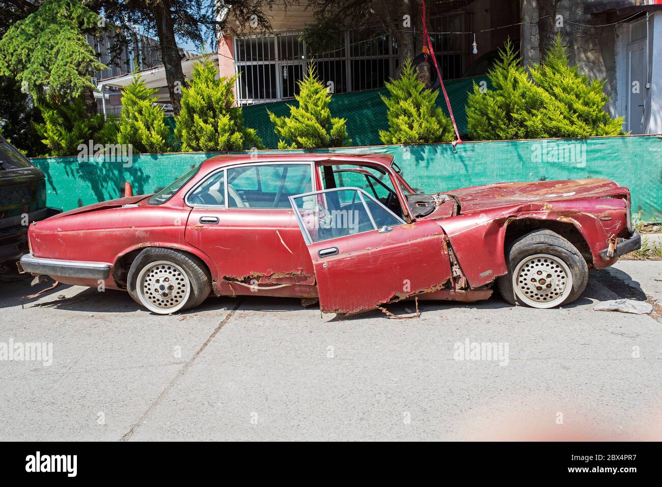 old wreck broken car on the street Stock Photo - Alamy