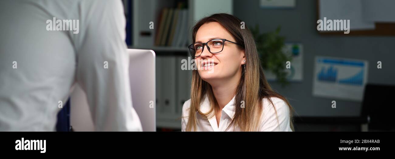 Smiling colleagues at work Stock Photo - Alamy