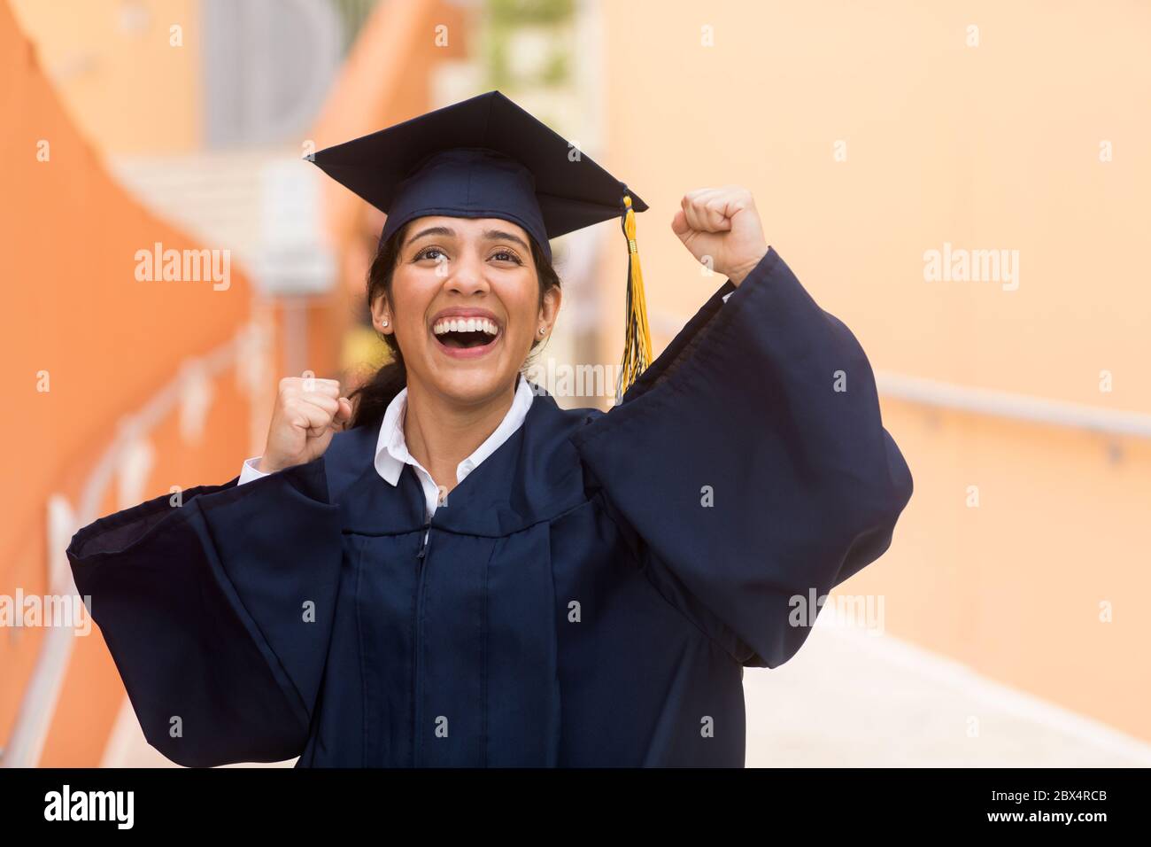 Young hispanic female graduate at her graduation Stock Photo - Alamy