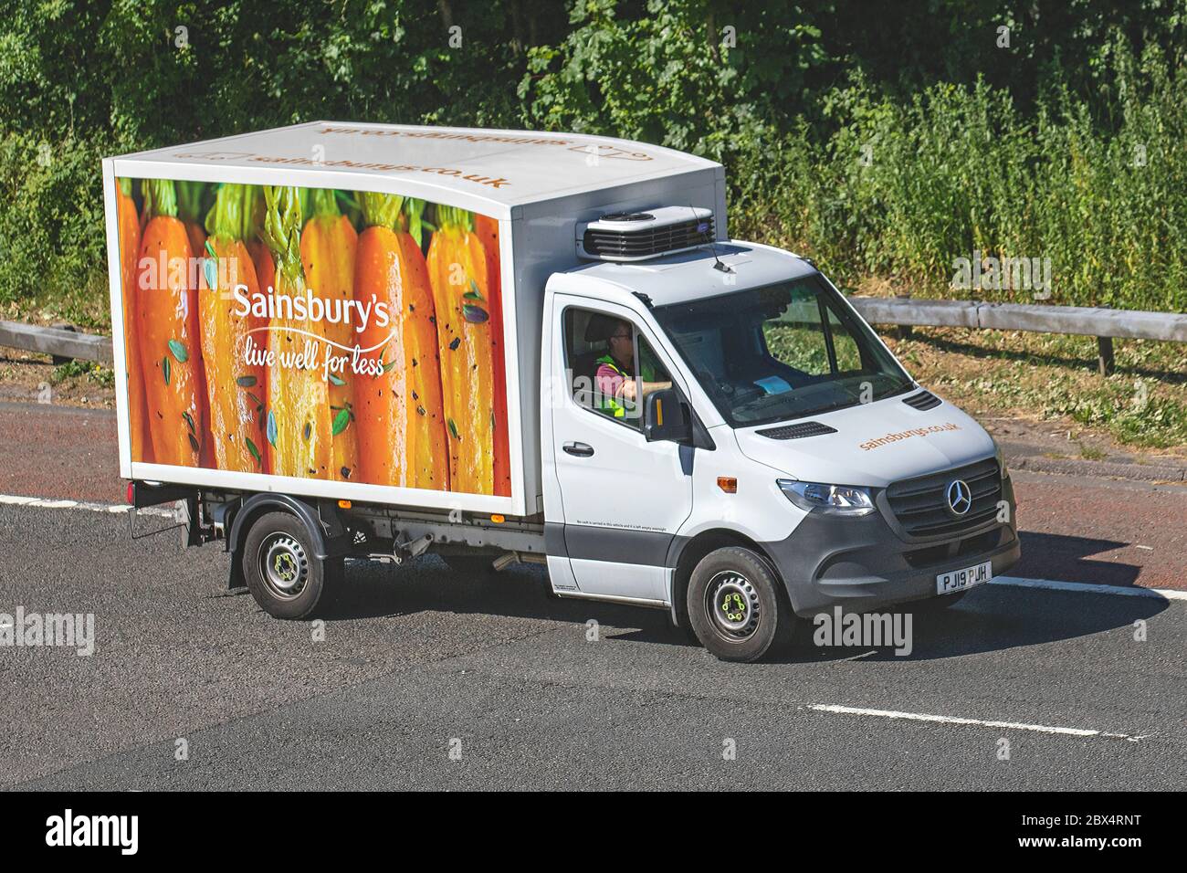 Sainsburys online shopping home delivery hi-res stock photography and ...