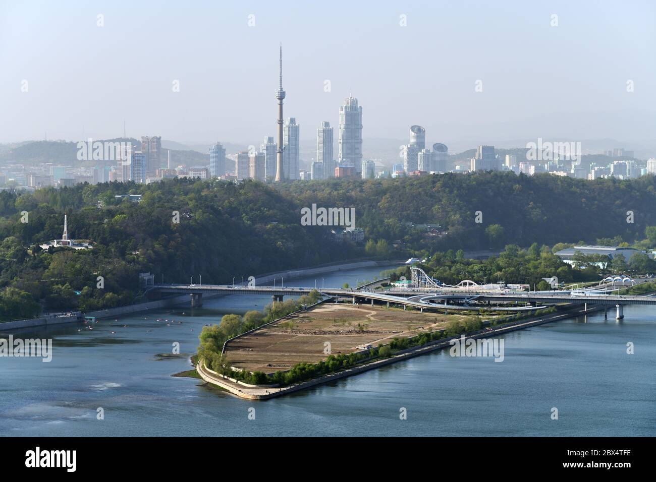 City skyline of Pyongyang, North Korea at sunset. Newly built Ryomyong ...