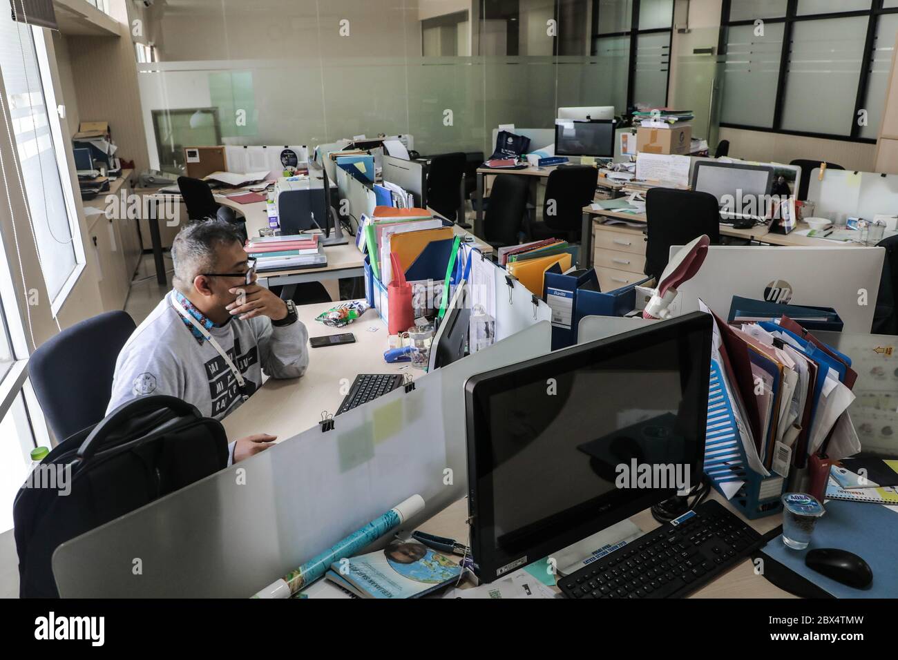 A civil servant working in a government office during the transition ...