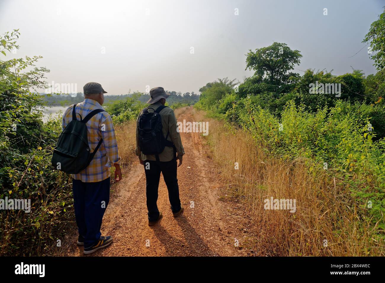 Group of people on walk through countryside Stock Photo - Alamy