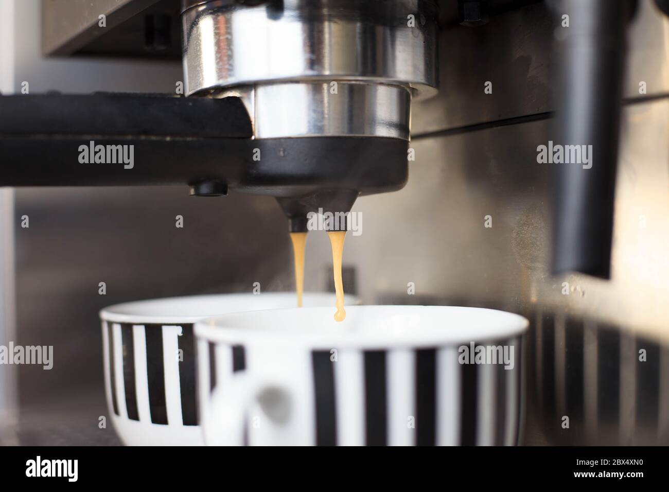 Closeup male barista holding out hi-res stock photography and images ...