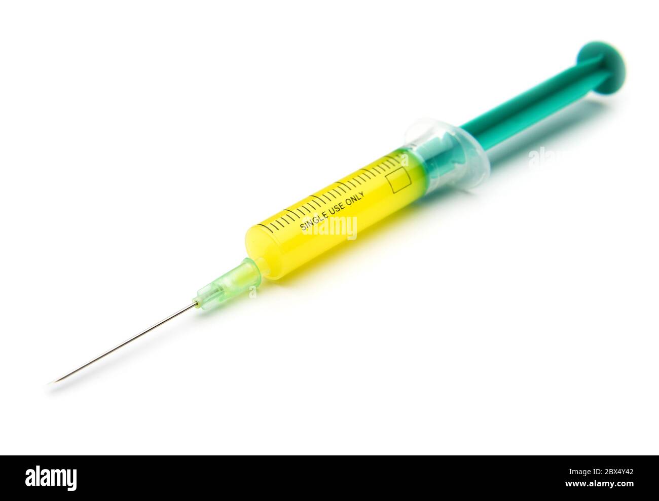 syringe filed with yellow liquid isolated on white background Stock ...