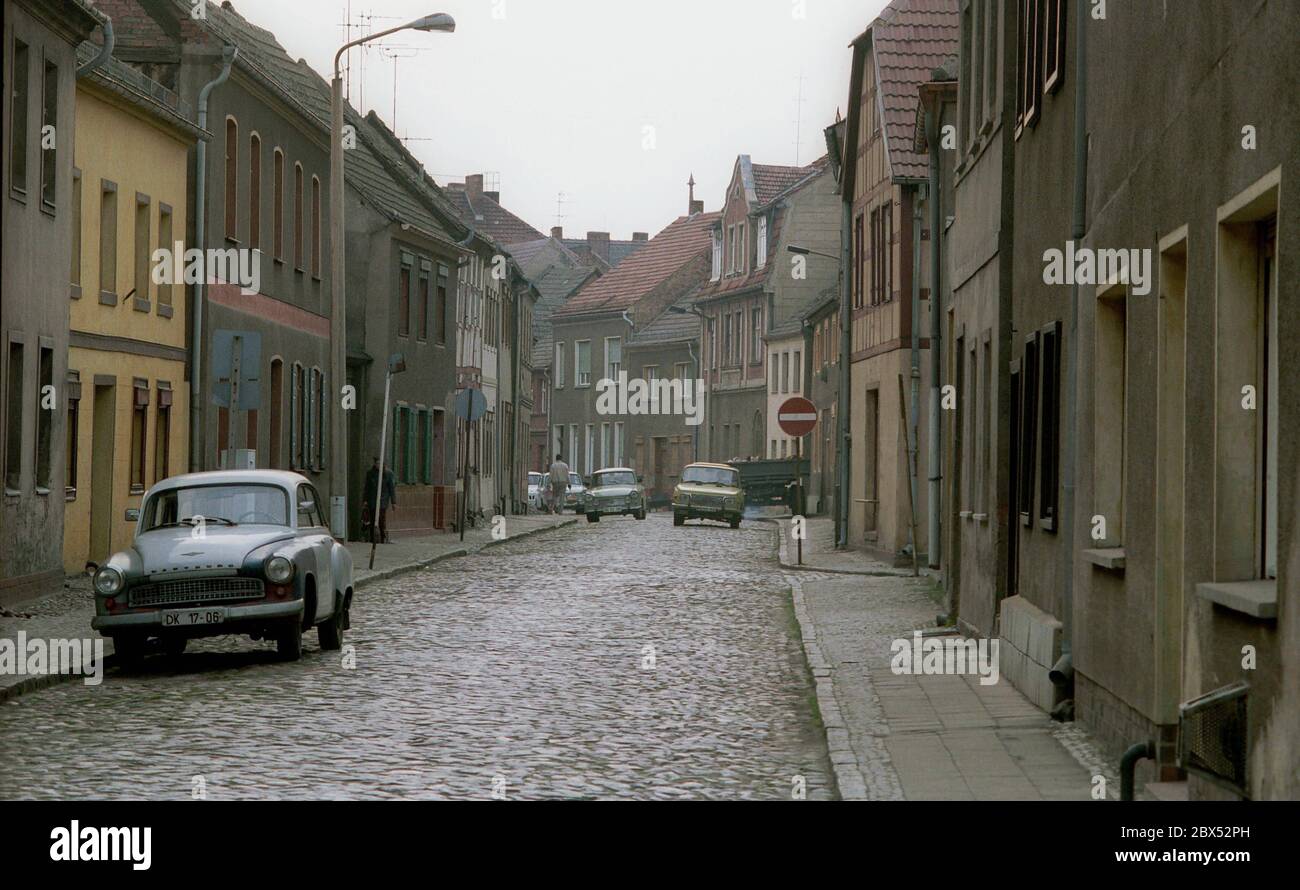 Brandenburg / GDR / early 1990 Jueterbog, old town, middle street. In ...