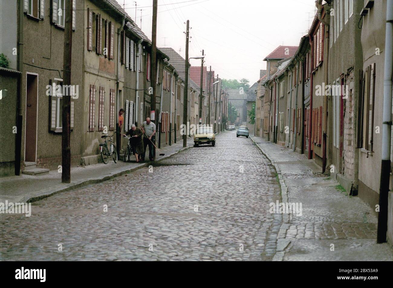 Brandenburg / GDR / early 1990 Jueterbog, old town, middle street. In ...