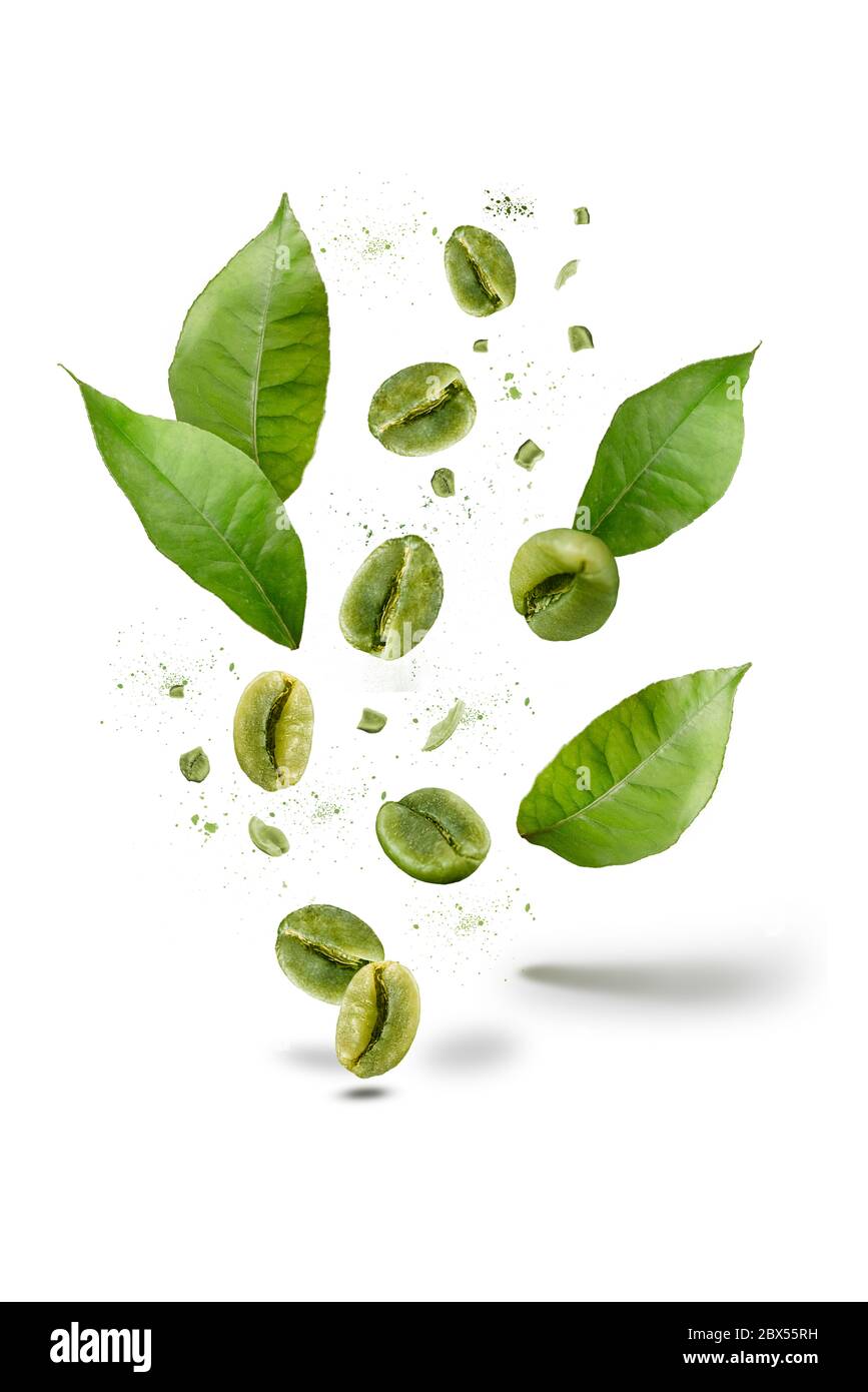 Green coffee beans explosion Stock Photo - Alamy