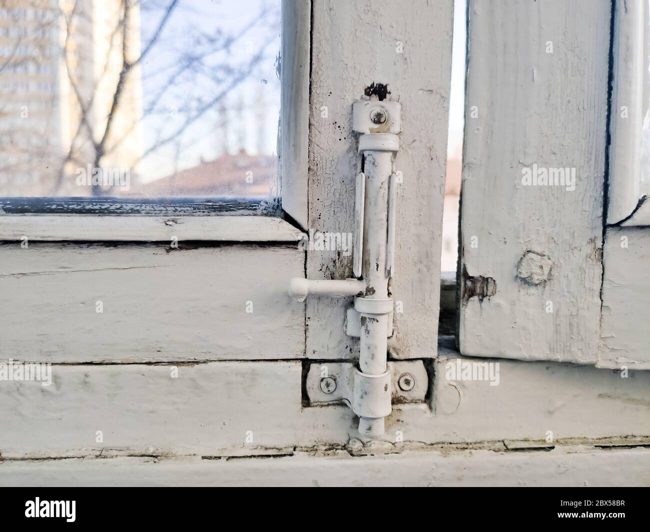 a vintage latch for an old window Stock Photo - Alamy