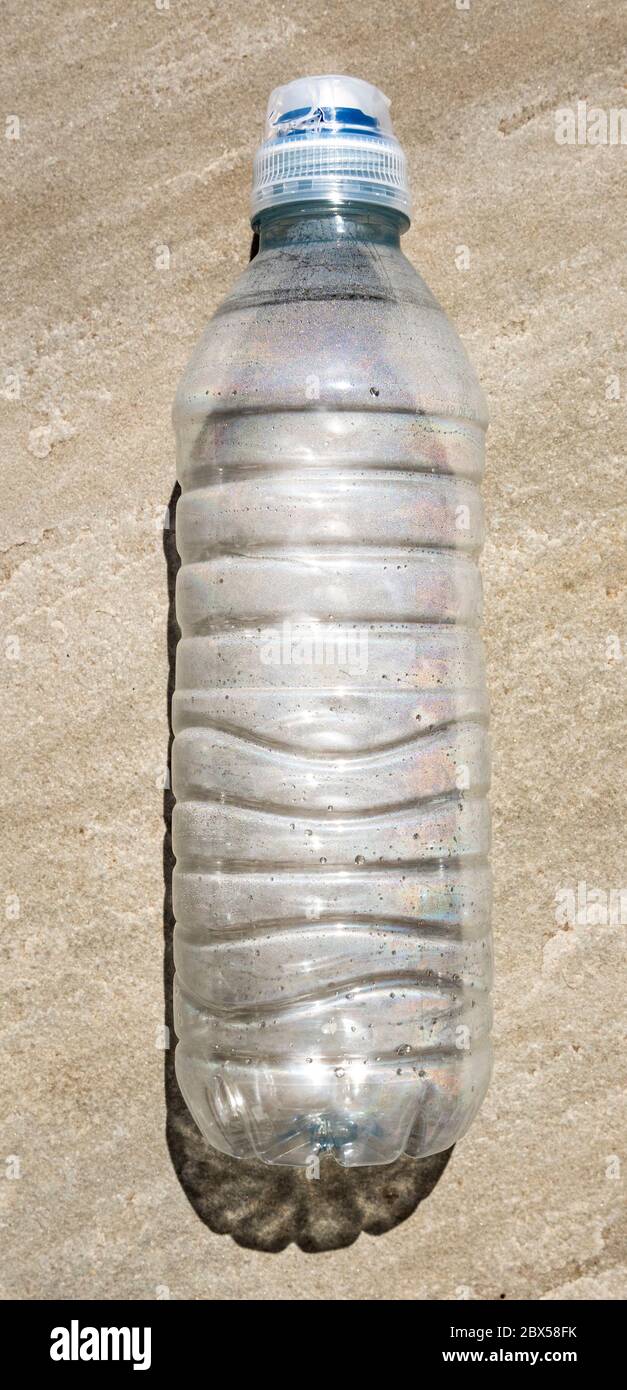 Empty plastic water bottle Stock Photo - Alamy