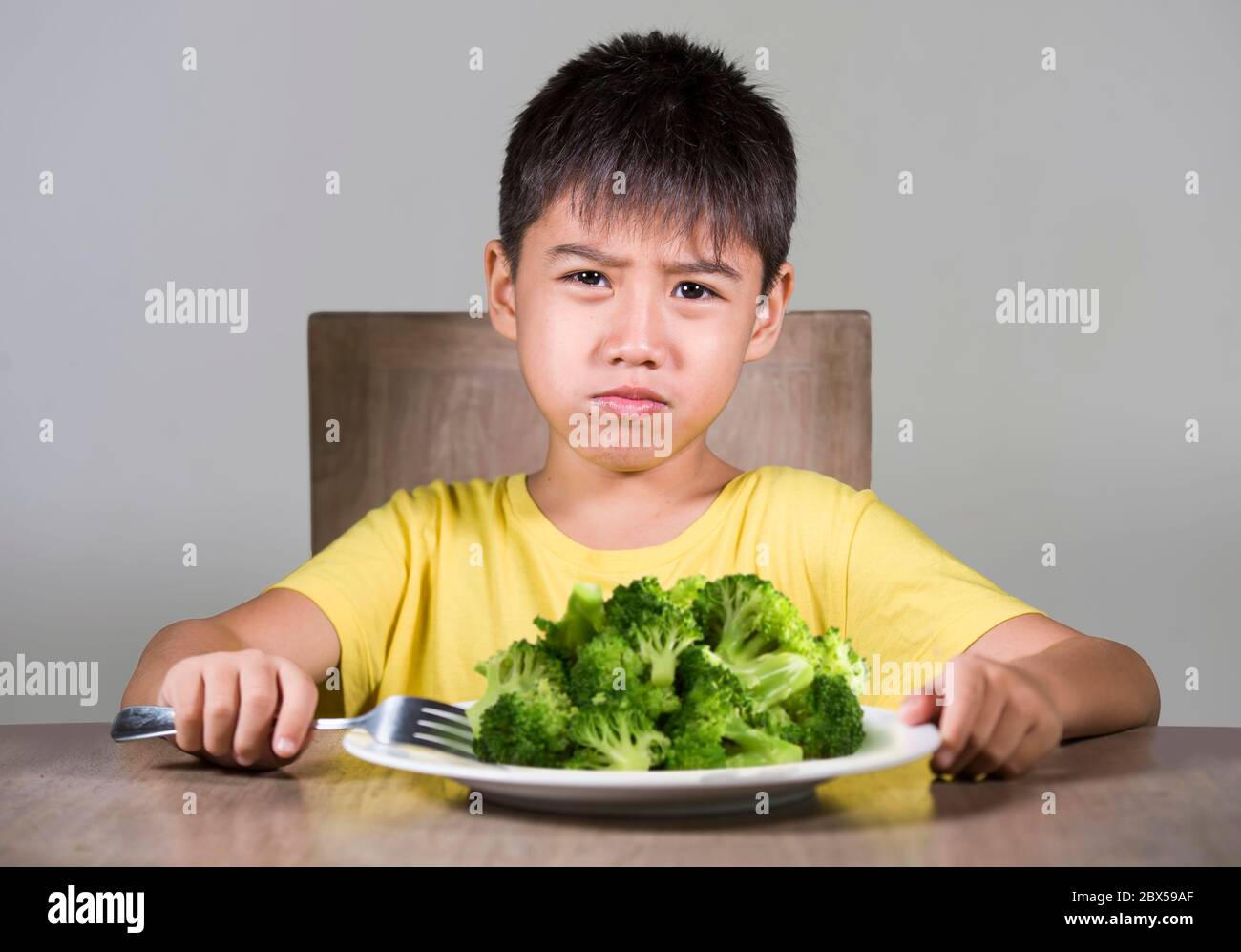 Child broccoli fork hi-res stock photography and images - Alamy