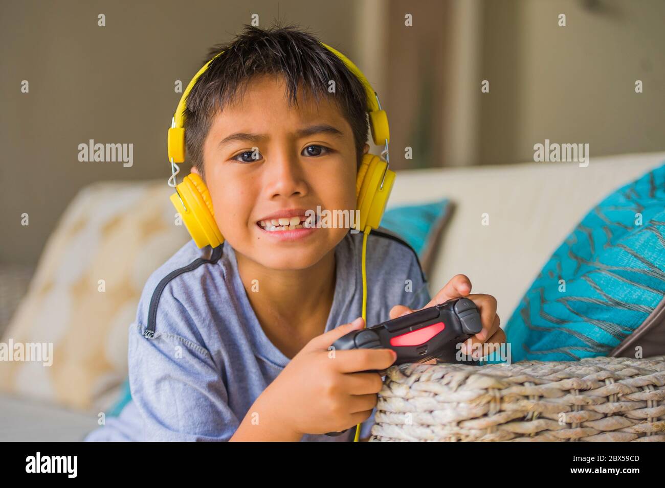 lifestyle portrait of young south Asian little kid excited and happy ...