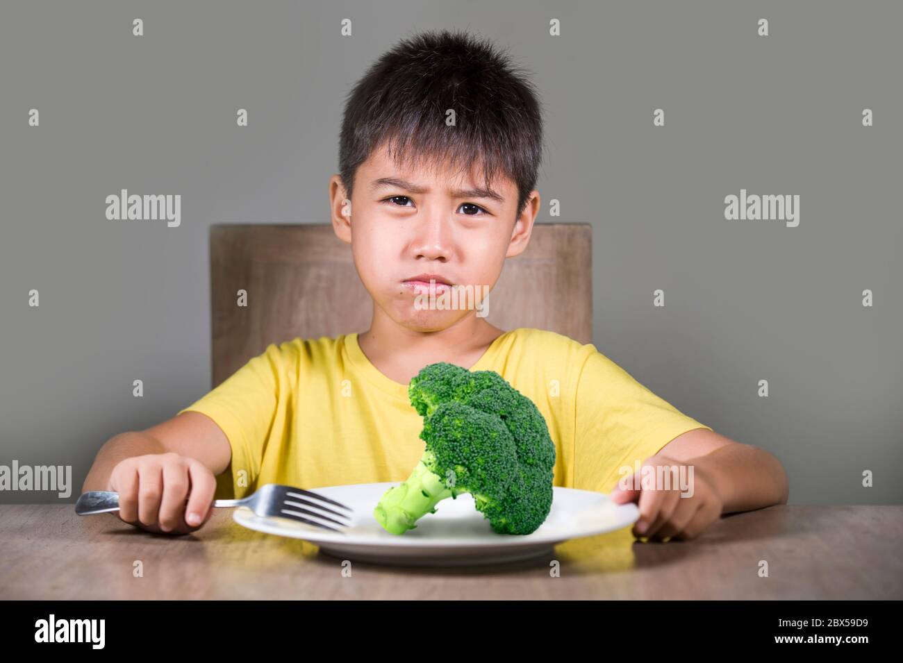Child with disgusted face hi-res stock photography and images - Alamy