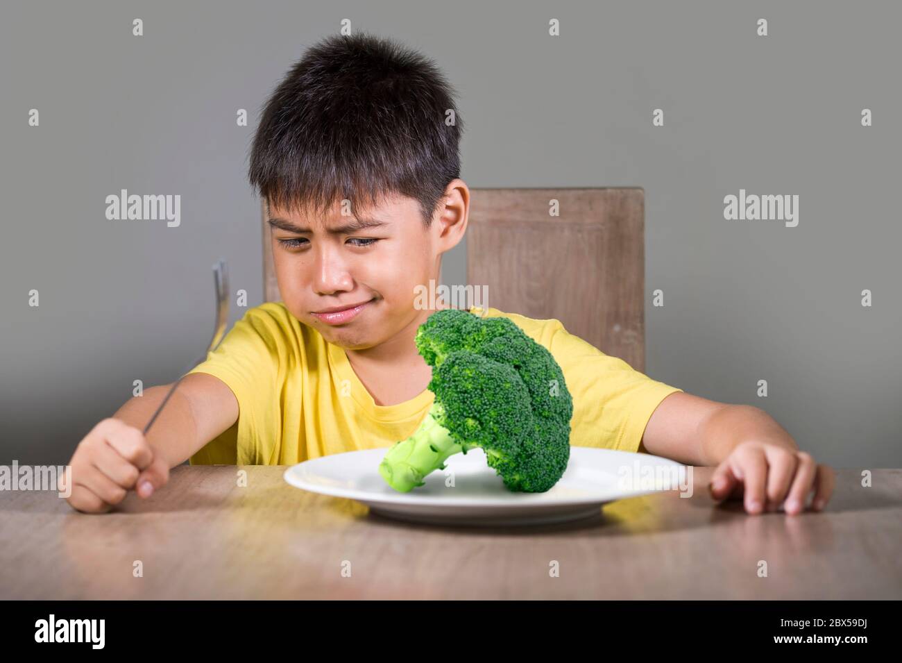 Child with disgusted face hi-res stock photography and images - Alamy