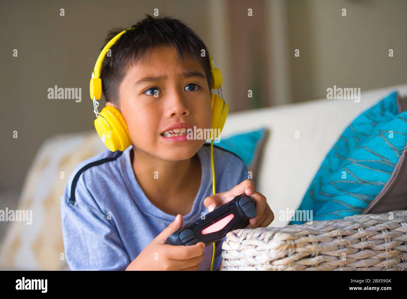 lifestyle portrait of south Asian little kid excited and happy playing ...