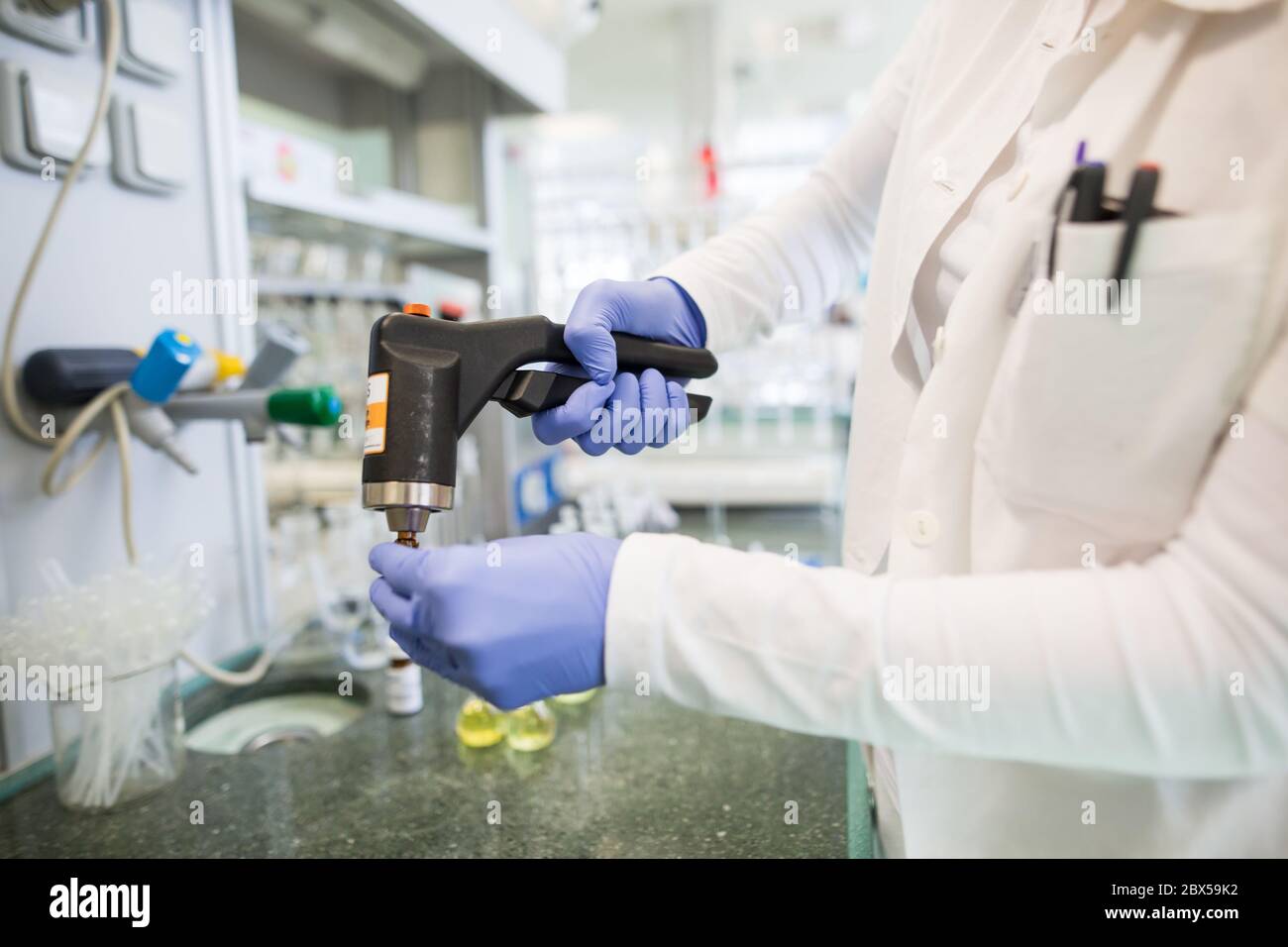 Flasks with liquids in a lab, pharmaceutical industry factory and ...