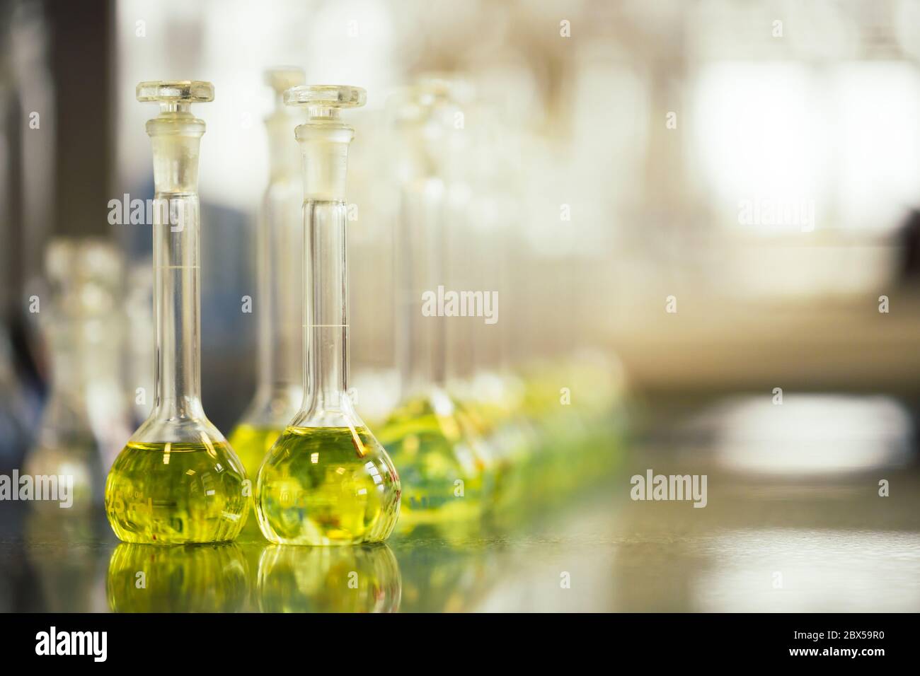 Flasks with liquids in a lab, pharmaceutical industry factory and ...