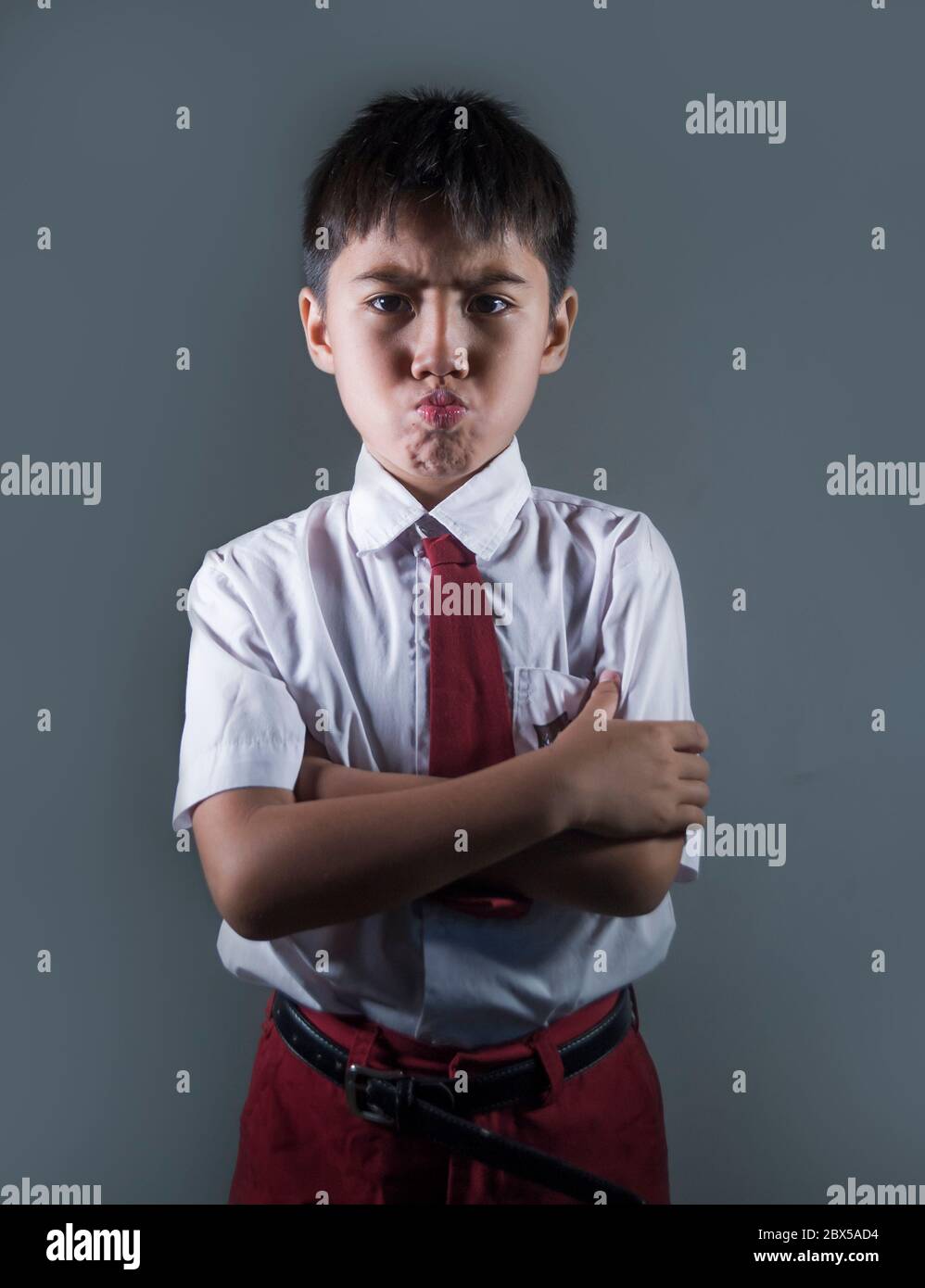 Embarrassed kid at school hi-res stock photography and images - Alamy