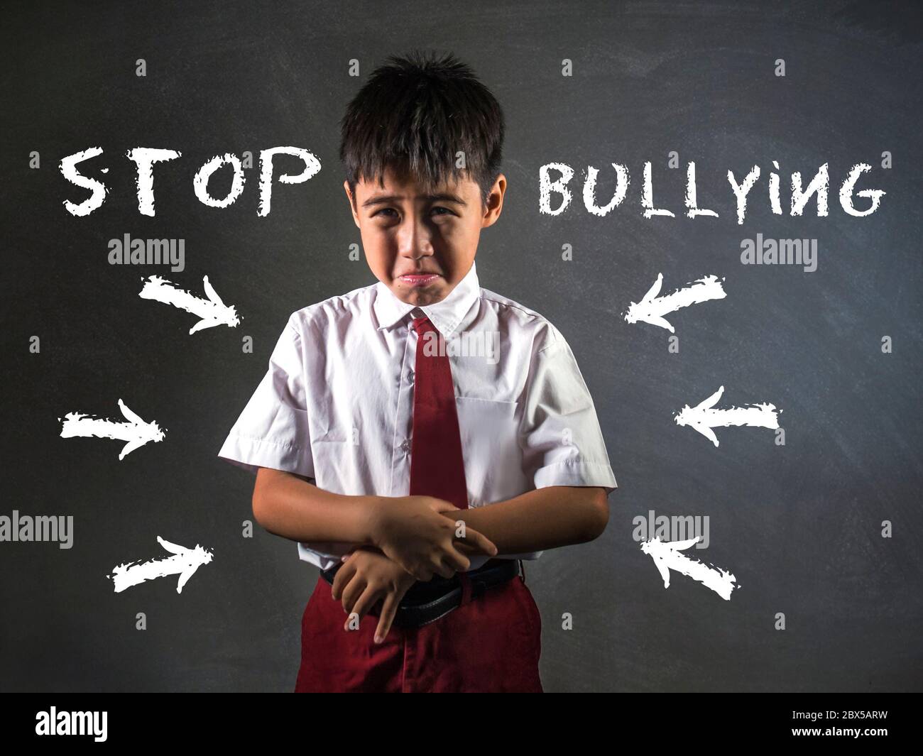 dramatic portrait of young desperate and abused schoolboy screaming and ...