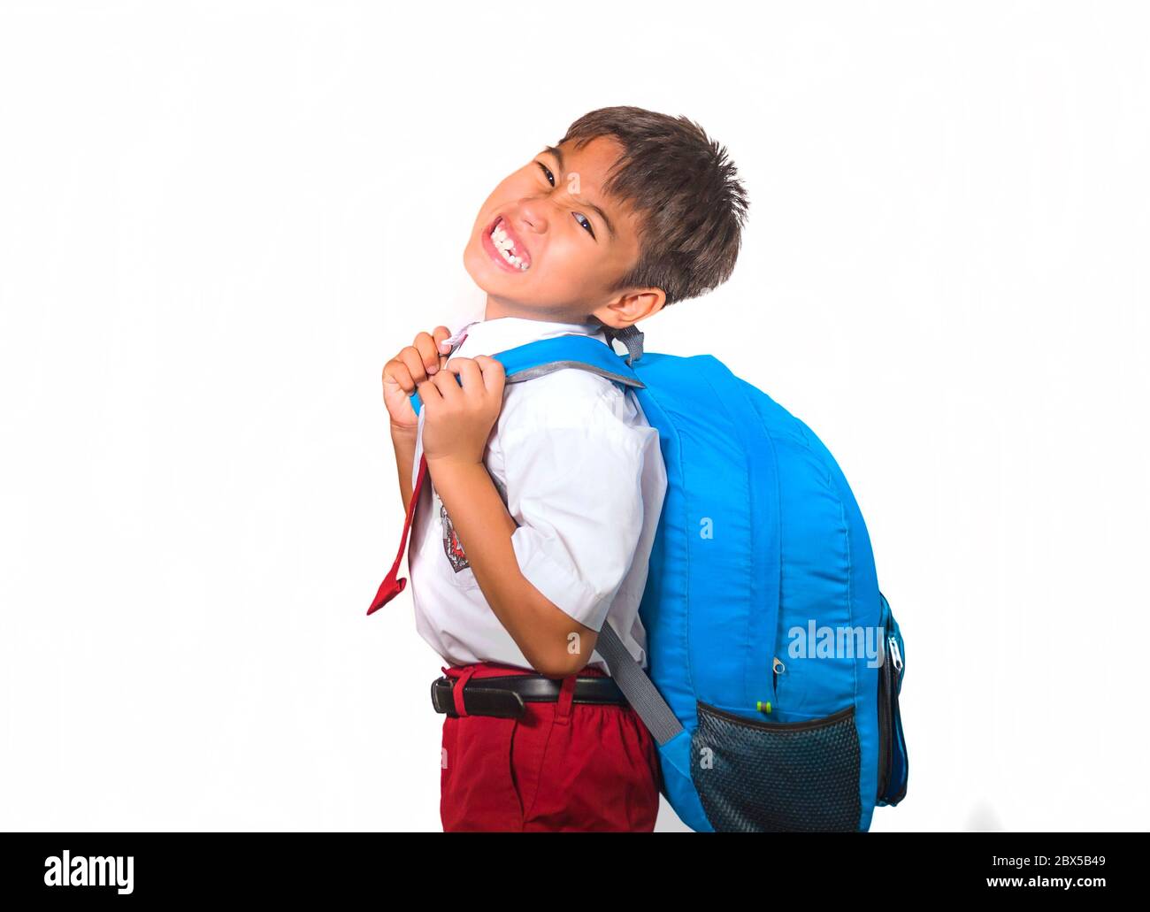 Child carrying heavy school bag hi-res stock photography and images - Alamy